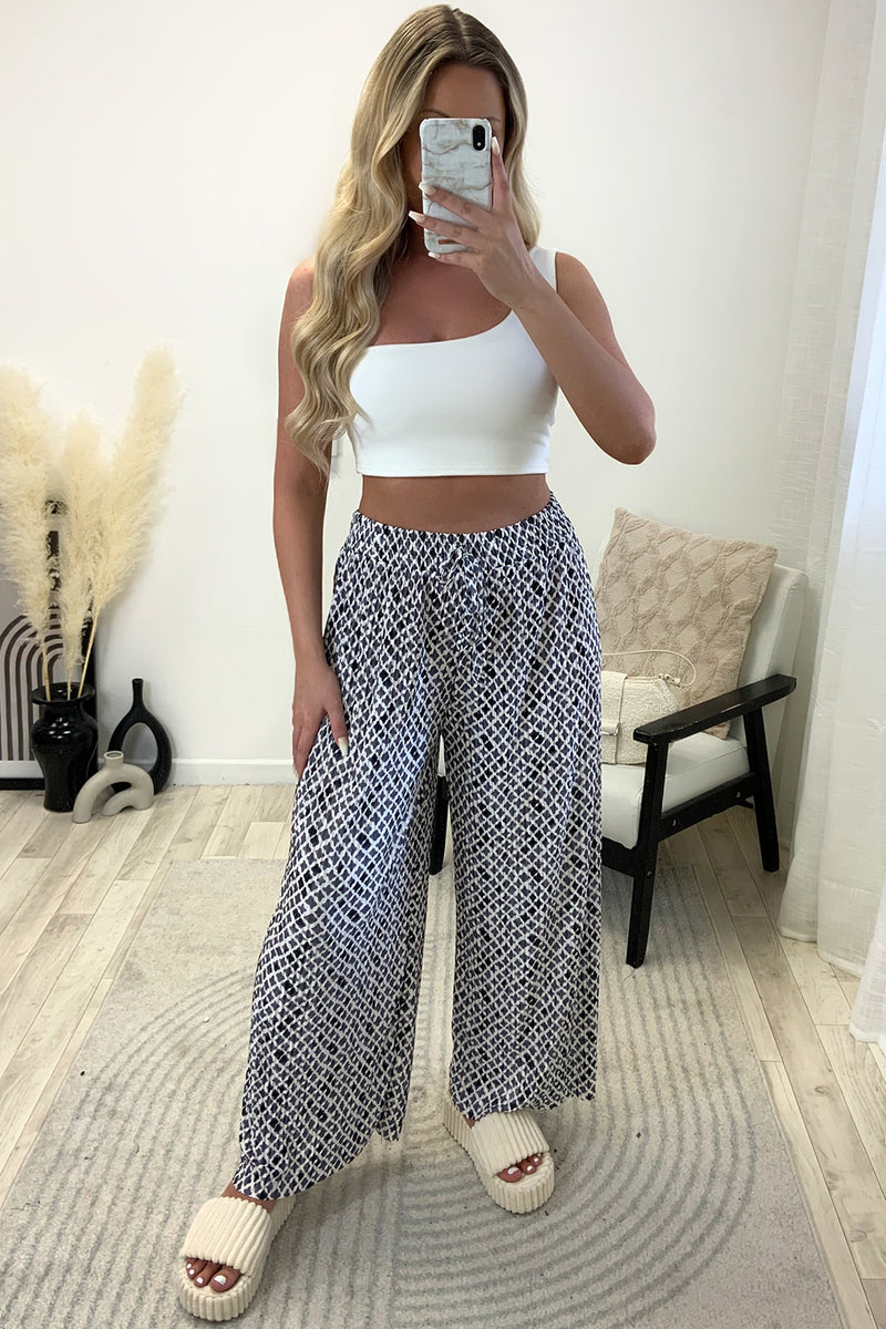 Christie Black and White Plisse Patterned Wide Leg Trousers – LASULA